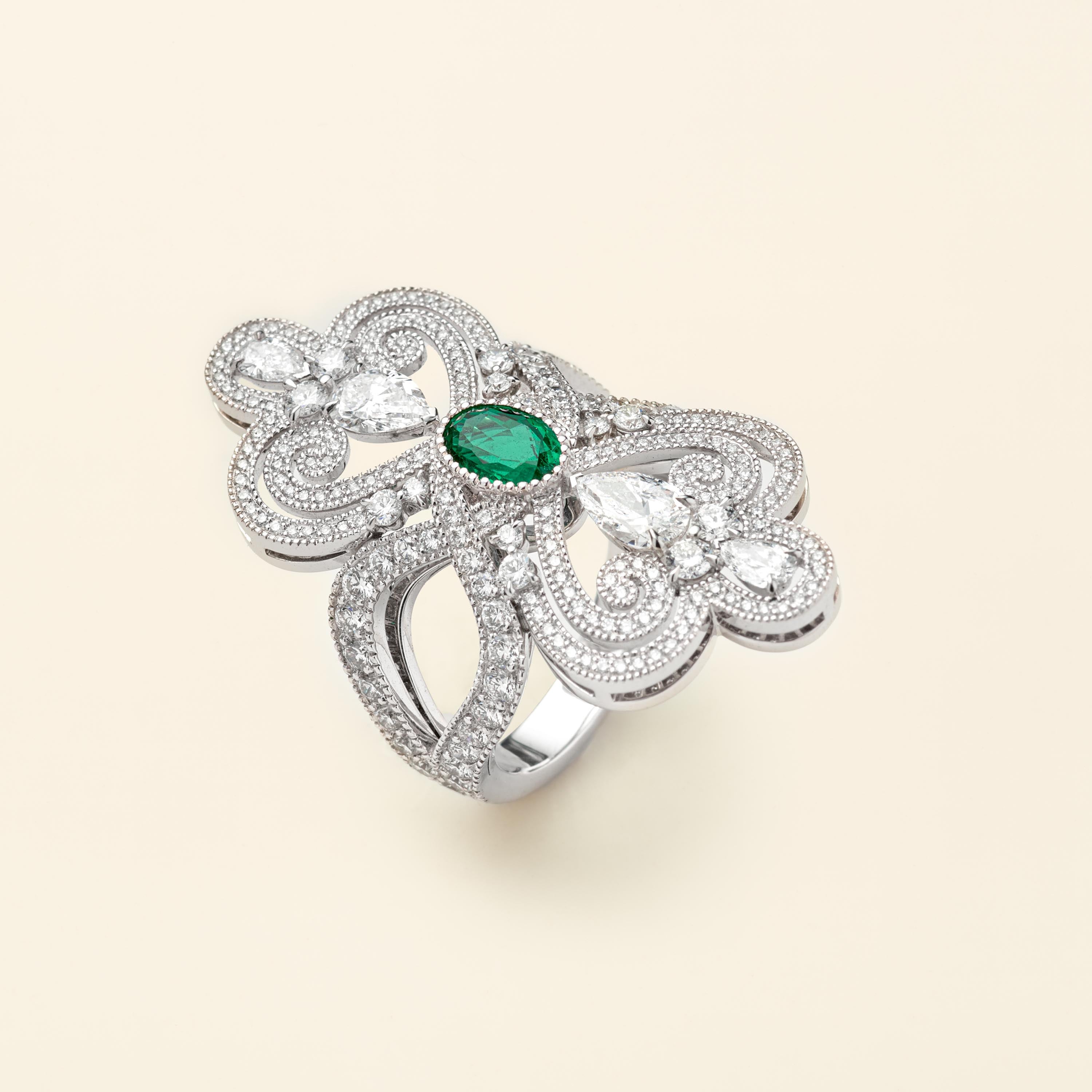 White Gold, Emerald, and Diamond High Jewelry Ring | Mellerio